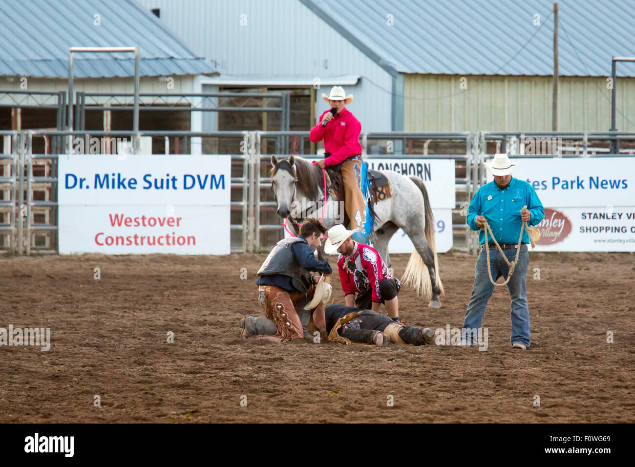 Estes Park, Colorado - Medical personnel attend to a rider at the ...