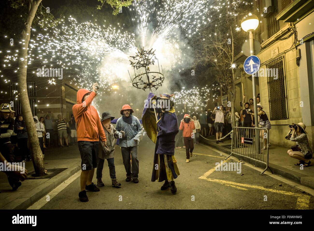 Barcelona, Catalonia, Spain. 21st Aug, 2015. Fire runners set off their ...