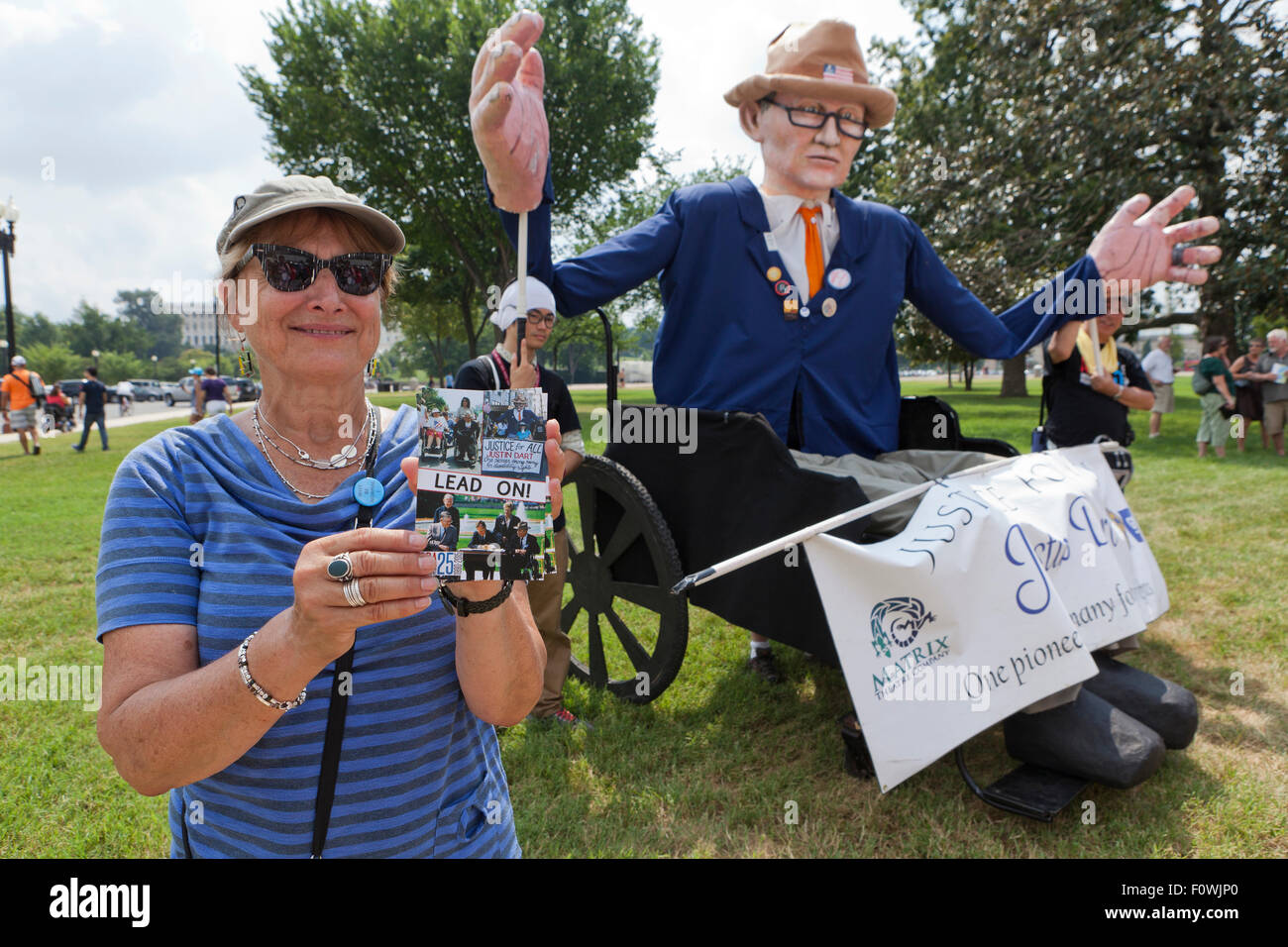 People with in wheelchairs and their family rally and march on Capitol ...