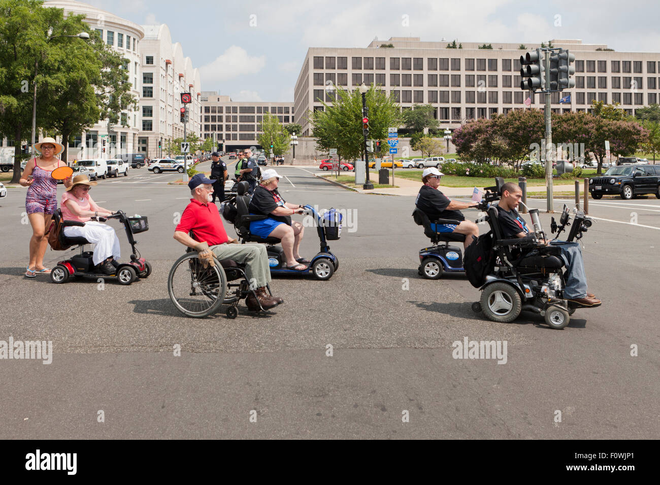 People with in wheelchairs and their family rally and march on Capitol ...