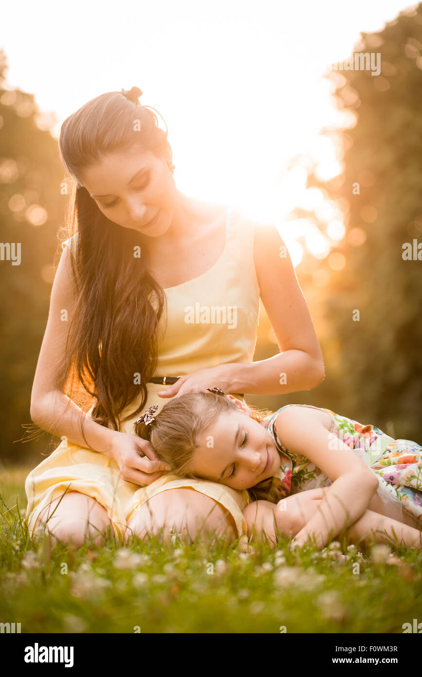 Hands on knees child hi-res stock photography and images - Alamy