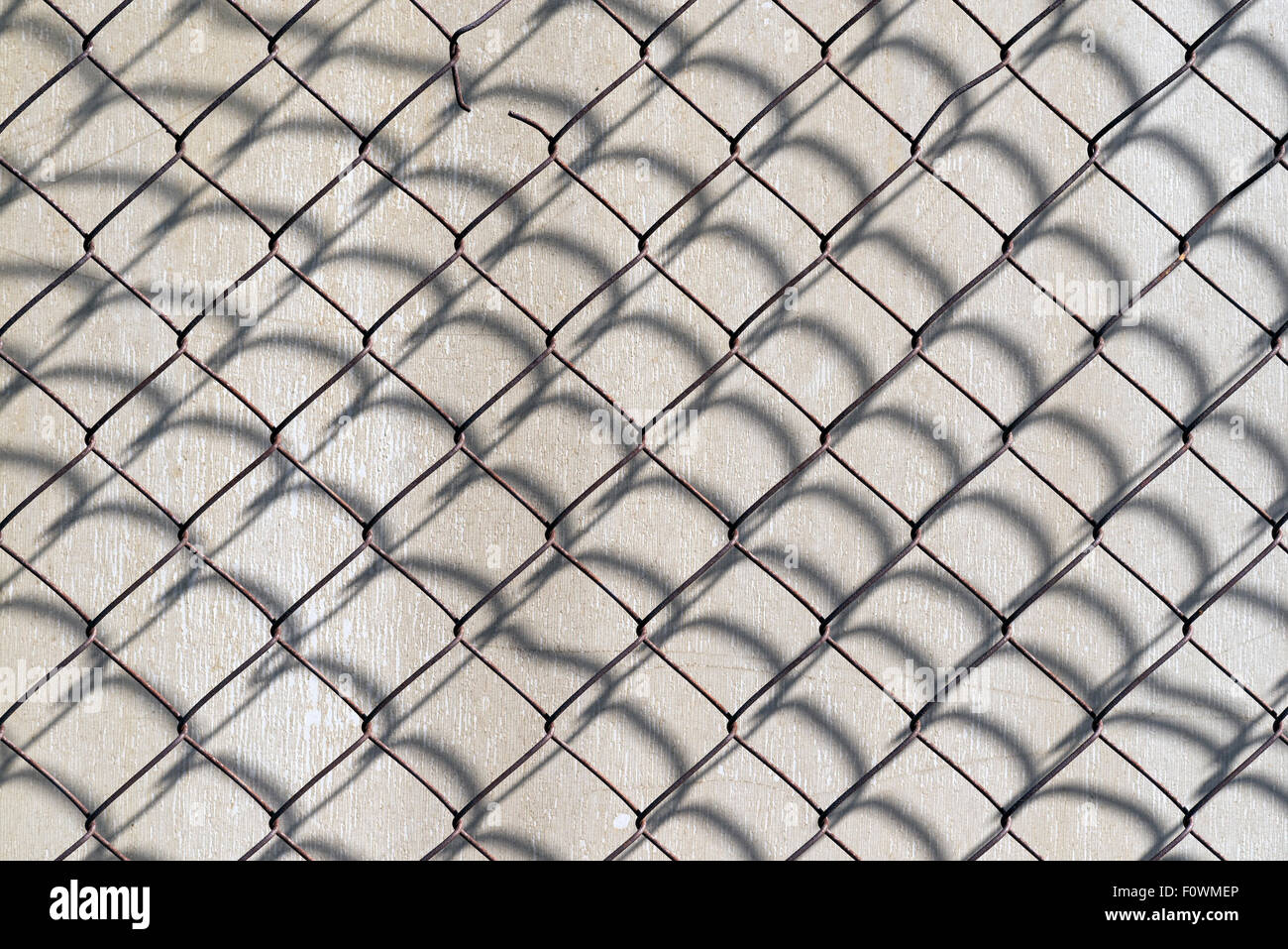 wire fence and its shadow Stock Photo - Alamy