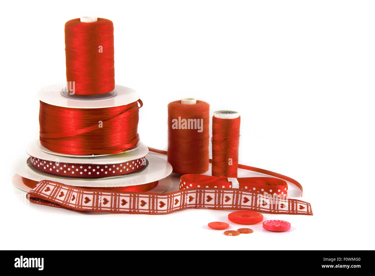 red craft, sewing and haberdashery items on white background Stock ...