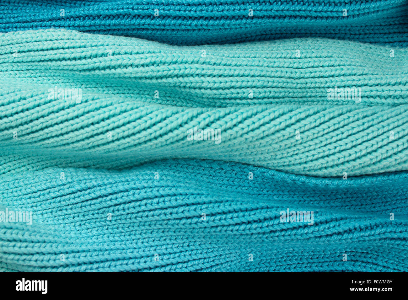 Turquoise wool wave effect background Stock Photo - Alamy
