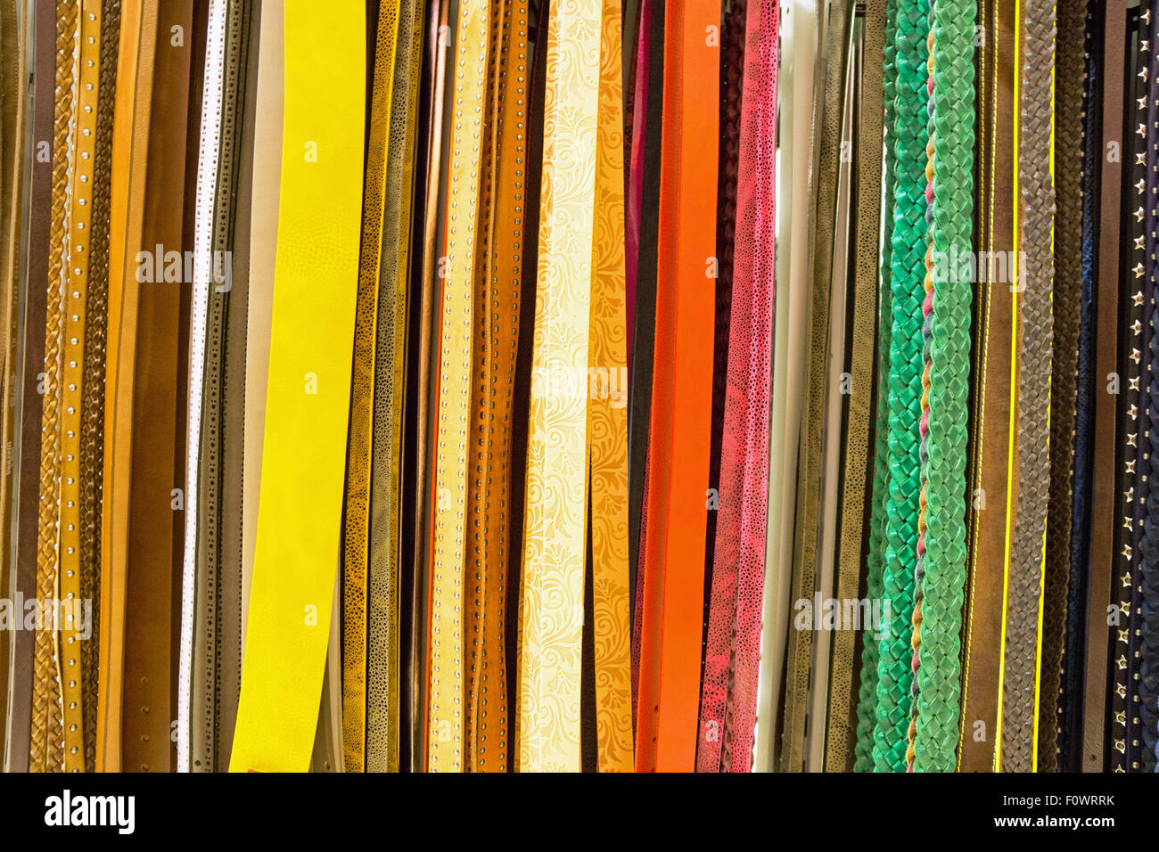 A variety of colourful belts for sale Stock Photo - Alamy