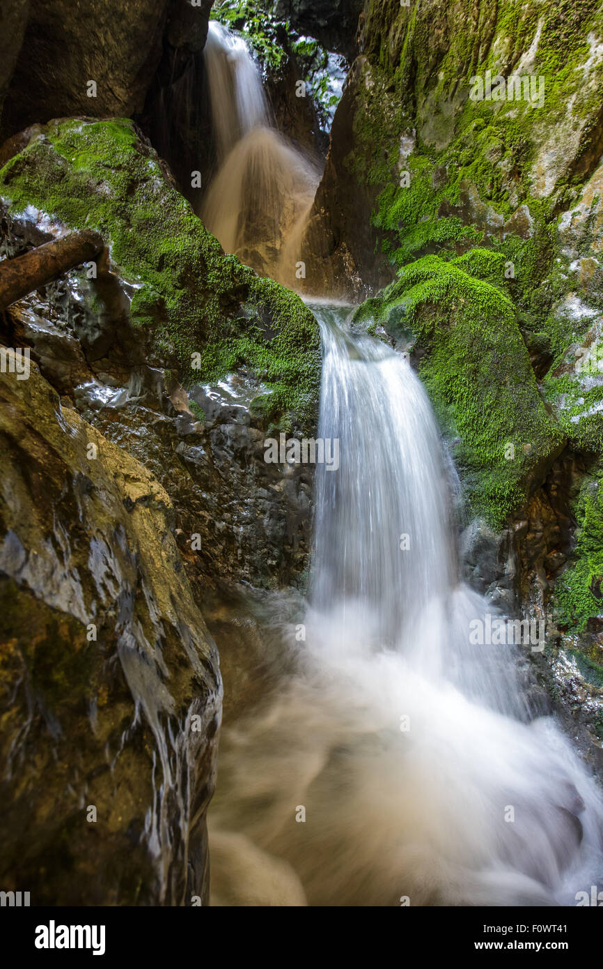 Underground river and waterfall from Cetatile Ponorului cave, Romania ...