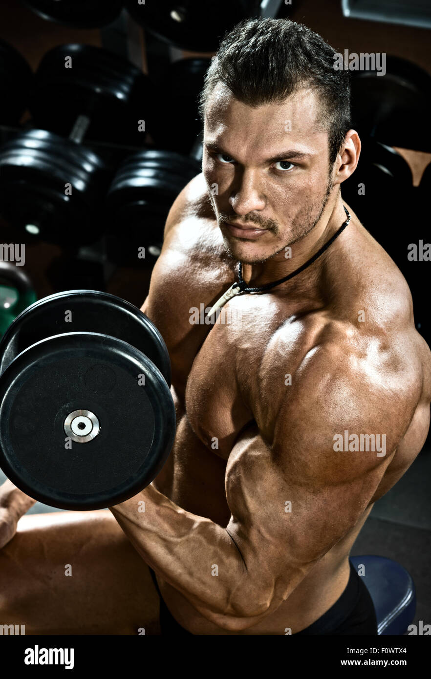 Handsome men exercising in gym hi-res stock photography and images - Alamy