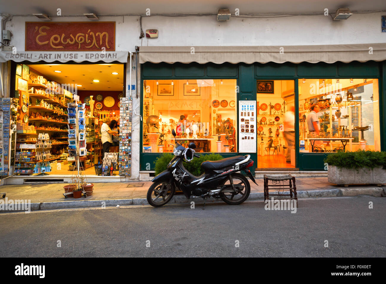 Tourists in a Greek souvenir shop in Plaka, Athens Stock Photo - Alamy