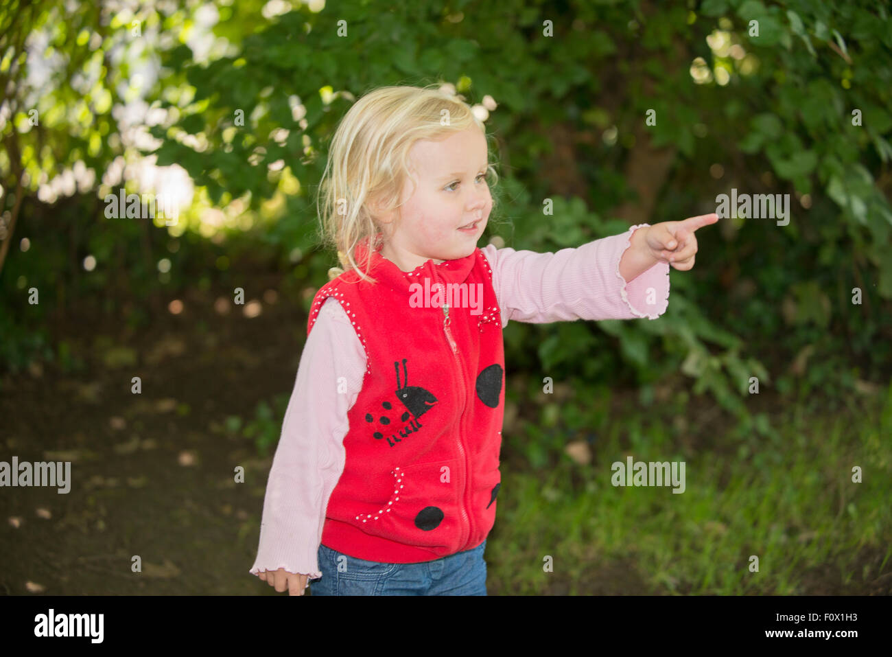 Young girl pointing Stock Photo - Alamy Young girl pointing Stock Photo - Alamy
