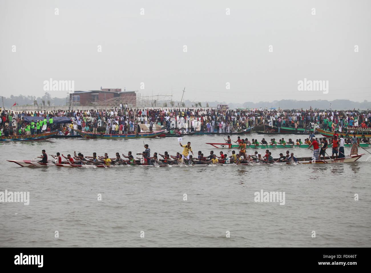 Dhaka, Bangladesh. 22nd Aug, 2015. Bangladeshi people row during a ...