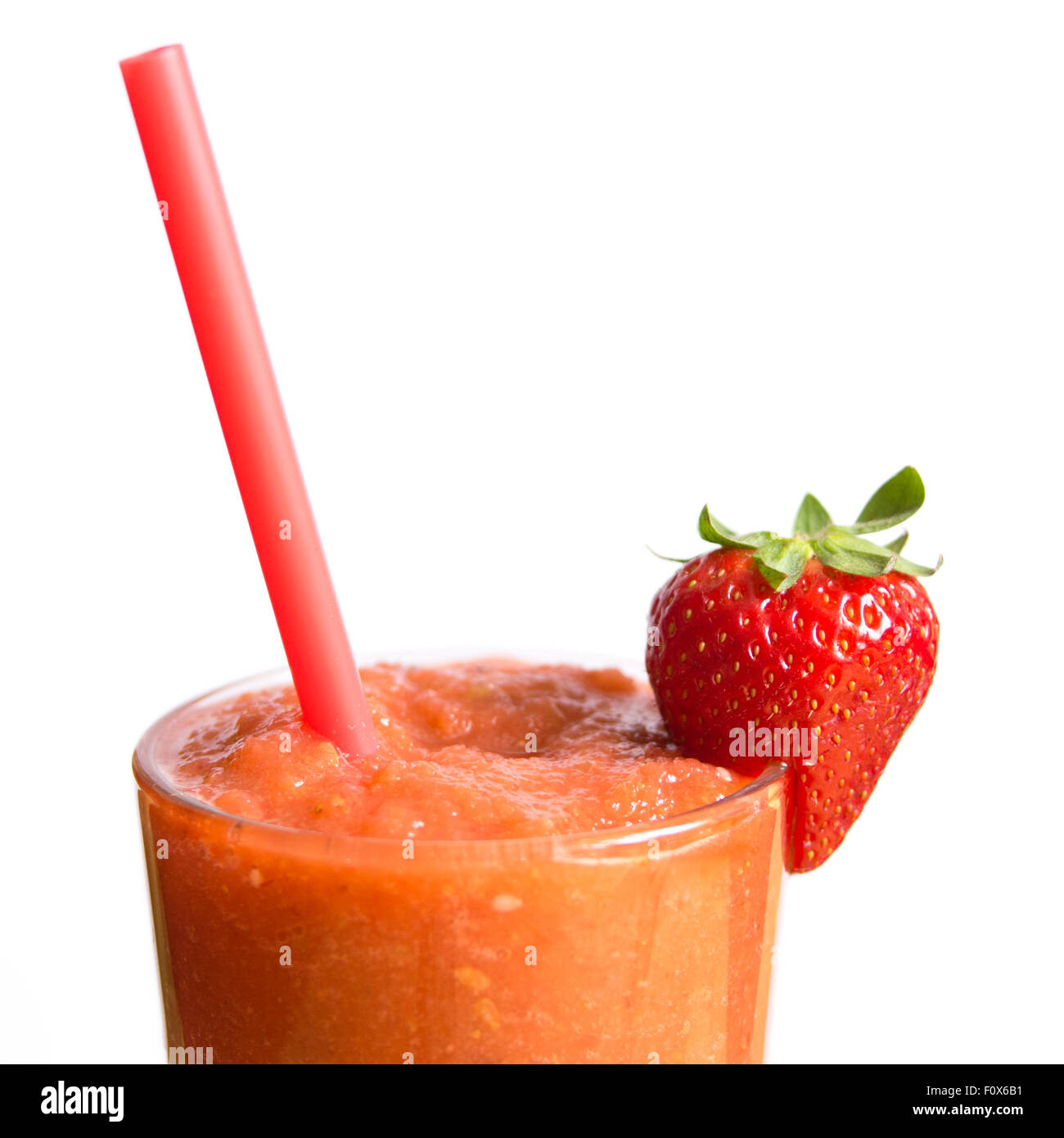 Strawberry smoothie in glass with straw, isolated Stock Photo - Alamy