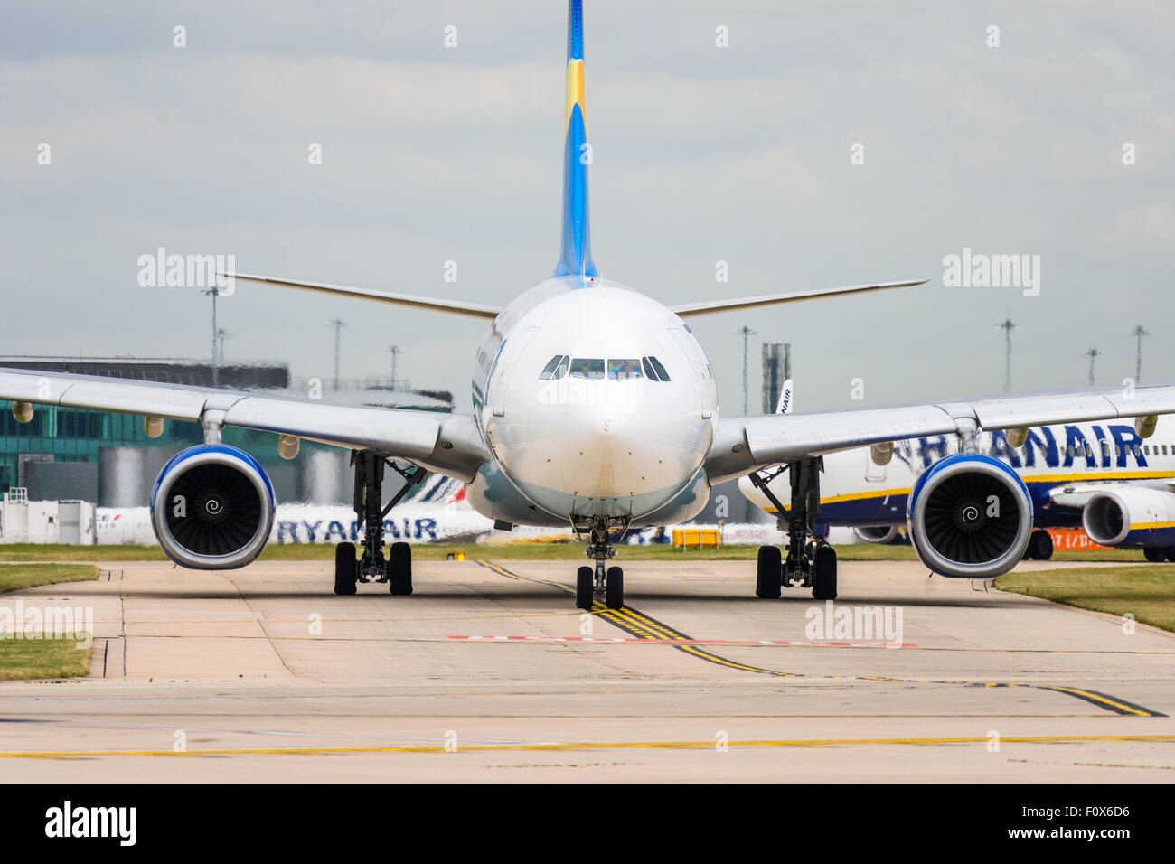 Head on view of a Thomas Cook Airbus A330-200 aeroplane travelling to ...