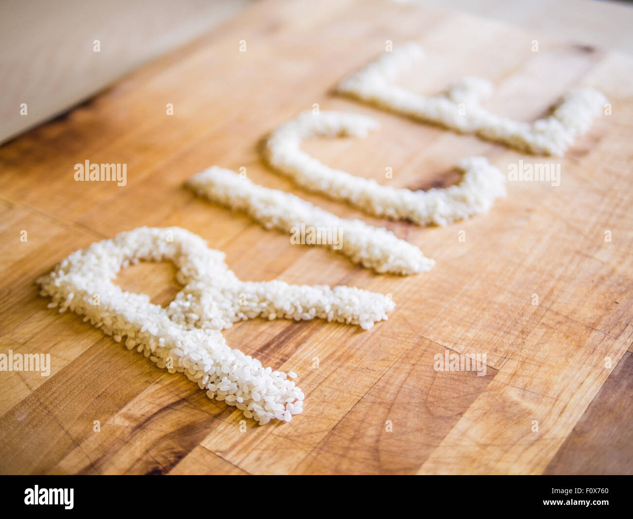 Rice word made of rice Stock Photo - Alamy