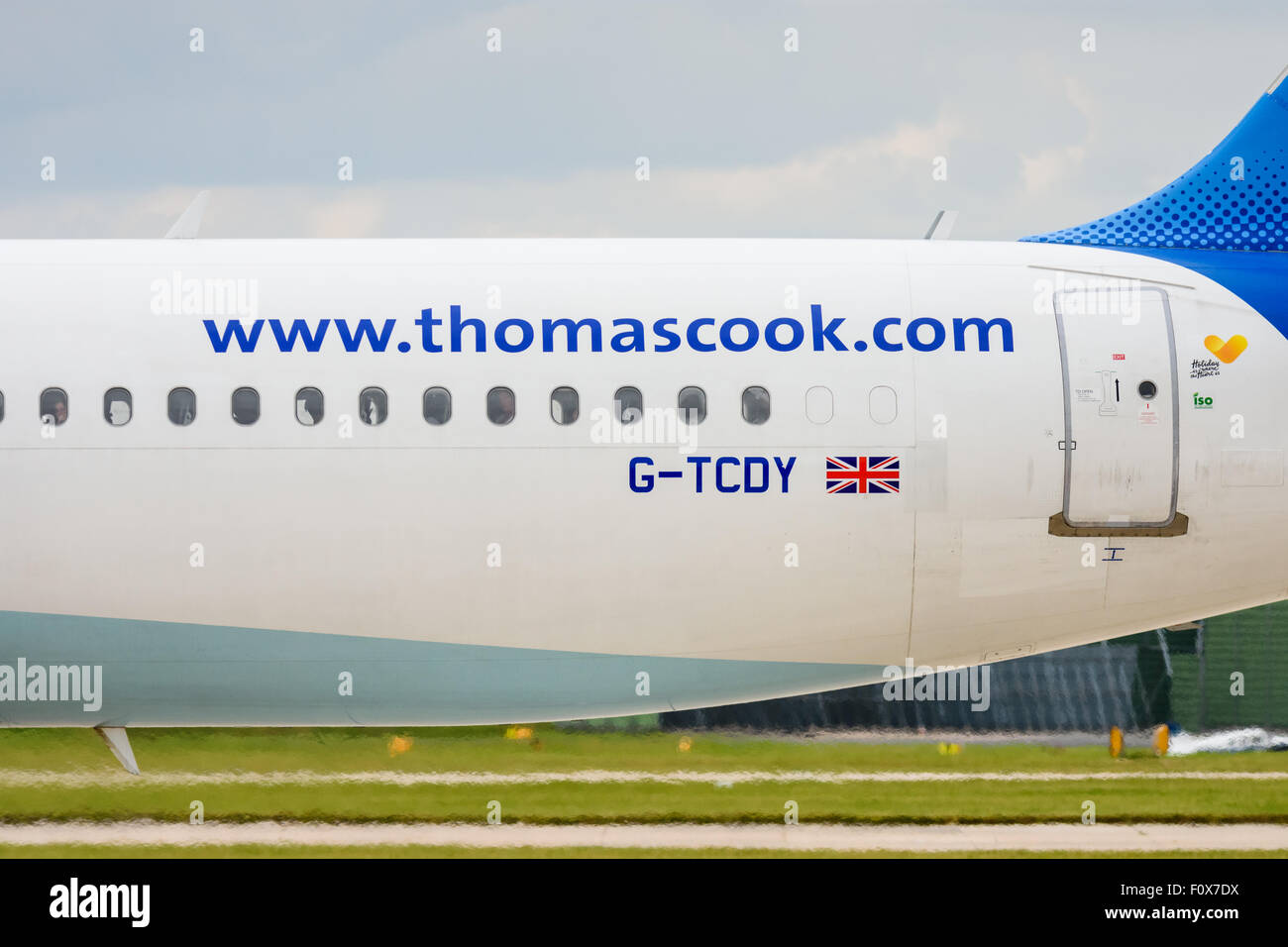 Side view of a Thomas Cook A321-200 aeroplane showing the companies ...