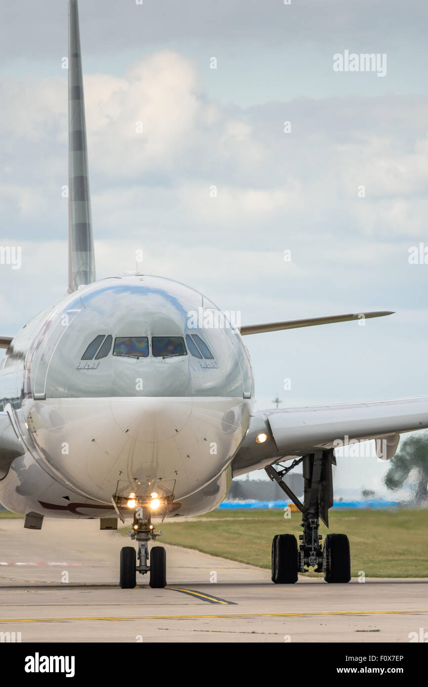 Head on view of a Qatar Airways Airbus A330-200 aeroplane joining the ...