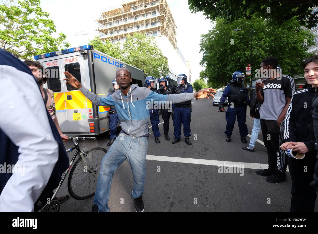 A mini riot occurred in East St as three Police officers came to aid a ...
