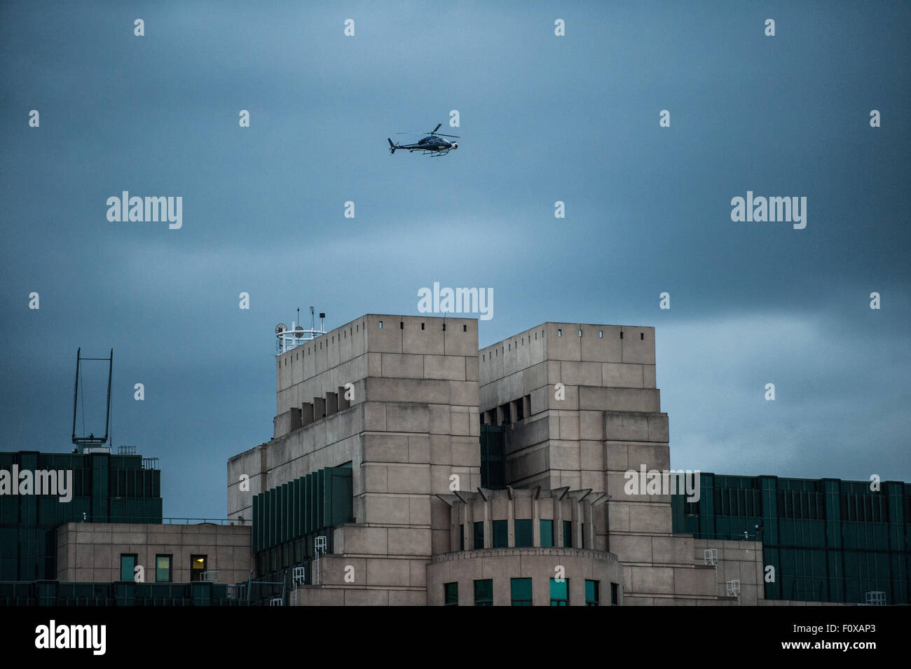 A military style boat in front of the MI6 building during filming of ...