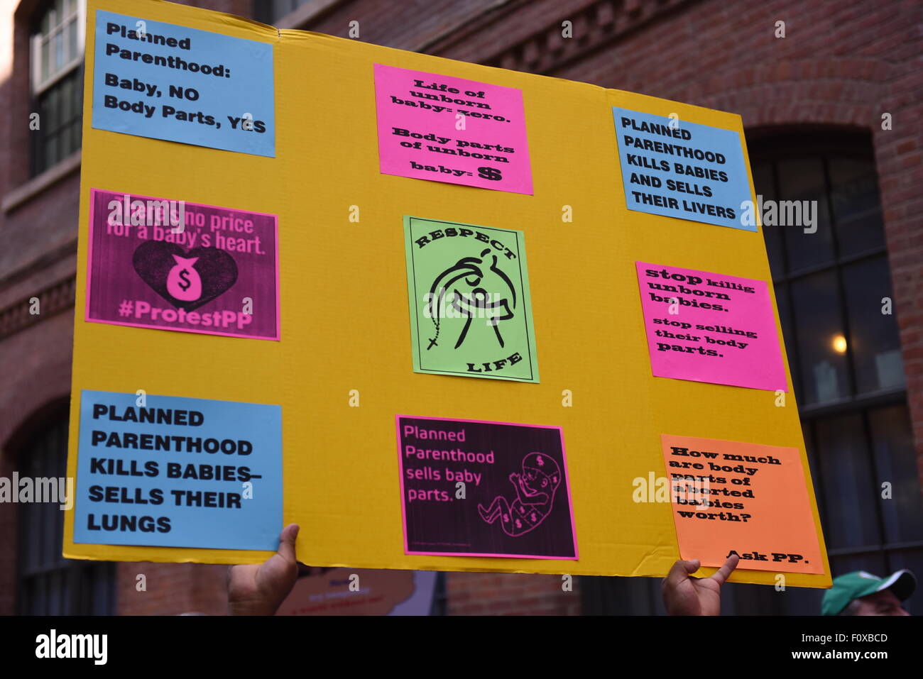New York City, United States. 22nd Aug, 2015. Handmade sign held aloft ...