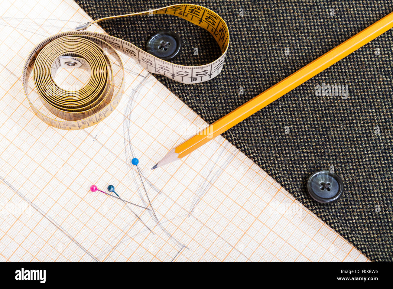 dressmaking still life - top view of cutting table with pattern ...