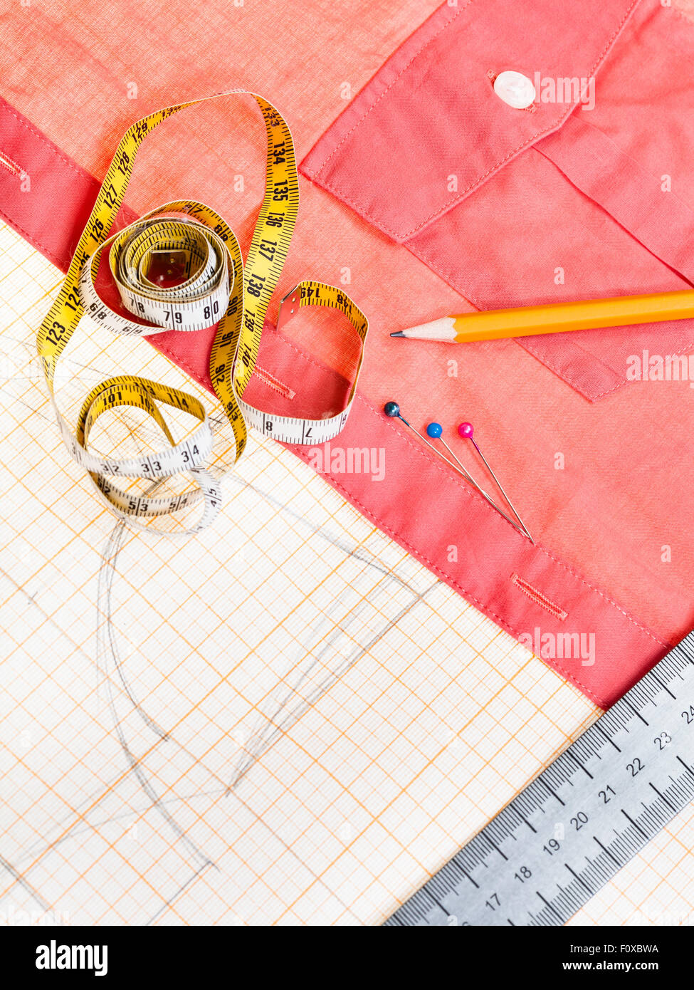 dressmaking still life - above view of cutting table with pattern ...