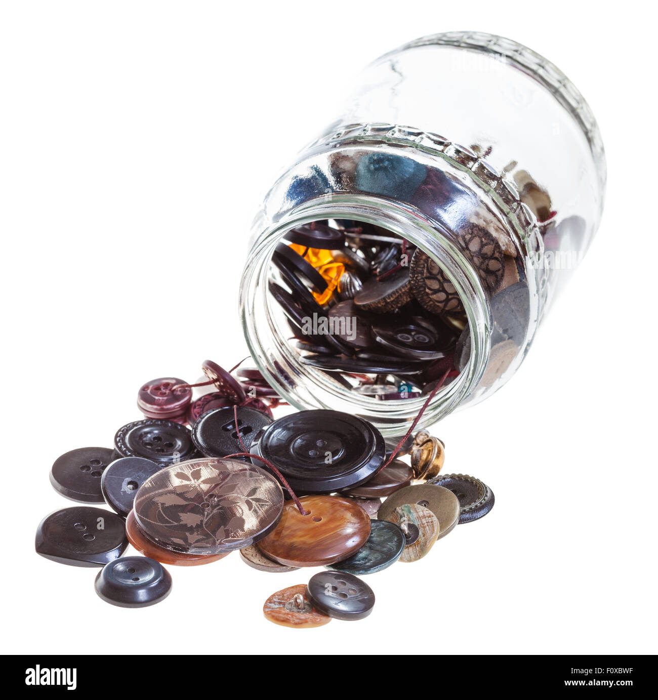 glass pot with clothes buttons isolated on white background Stock Photo ...