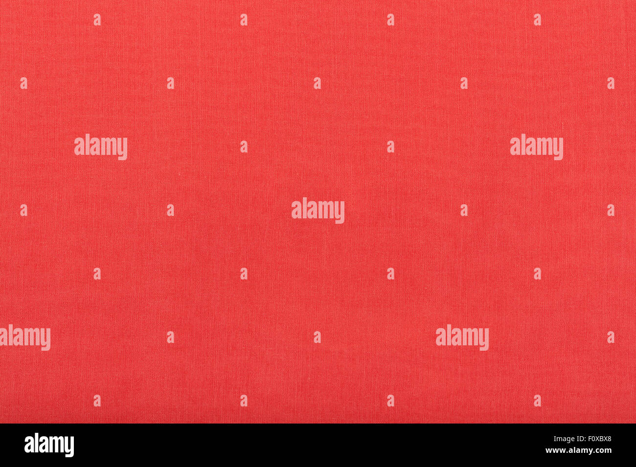 background from red batiste fabric close up Stock Photo - Alamy
