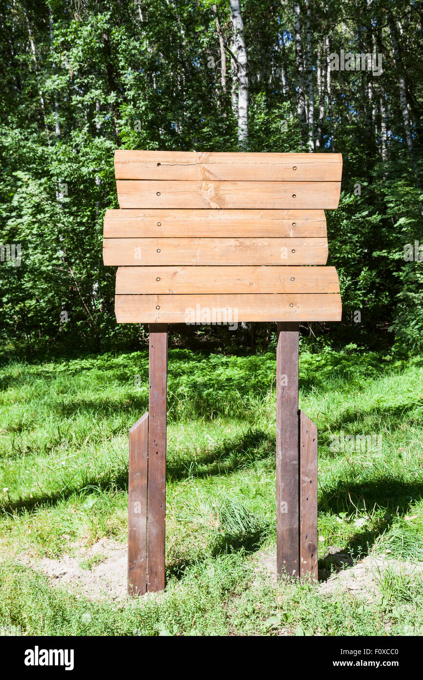 wooden outdoor pointer in forest in summer day Stock Photo - Alamy