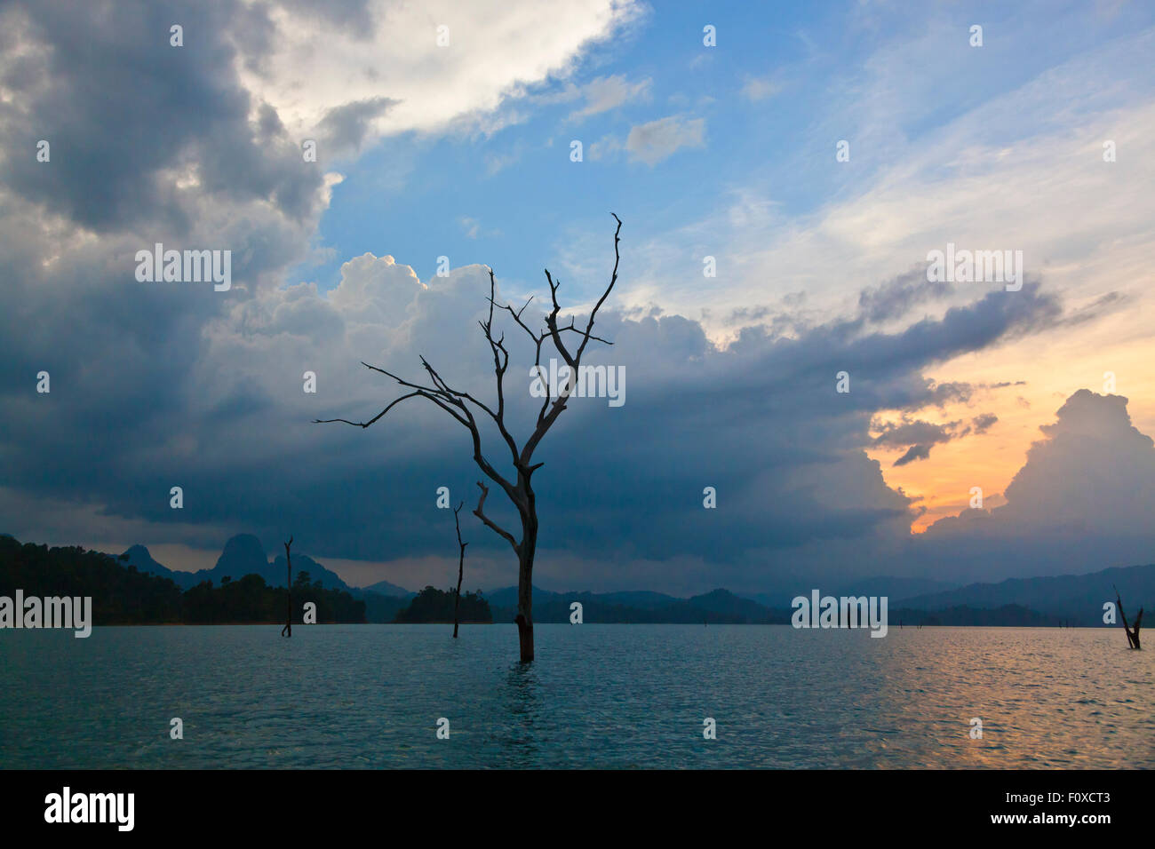 Sunset and storm clouds on CHEOW EN LAKE in KHAO SOK NATIONAL PARK ...