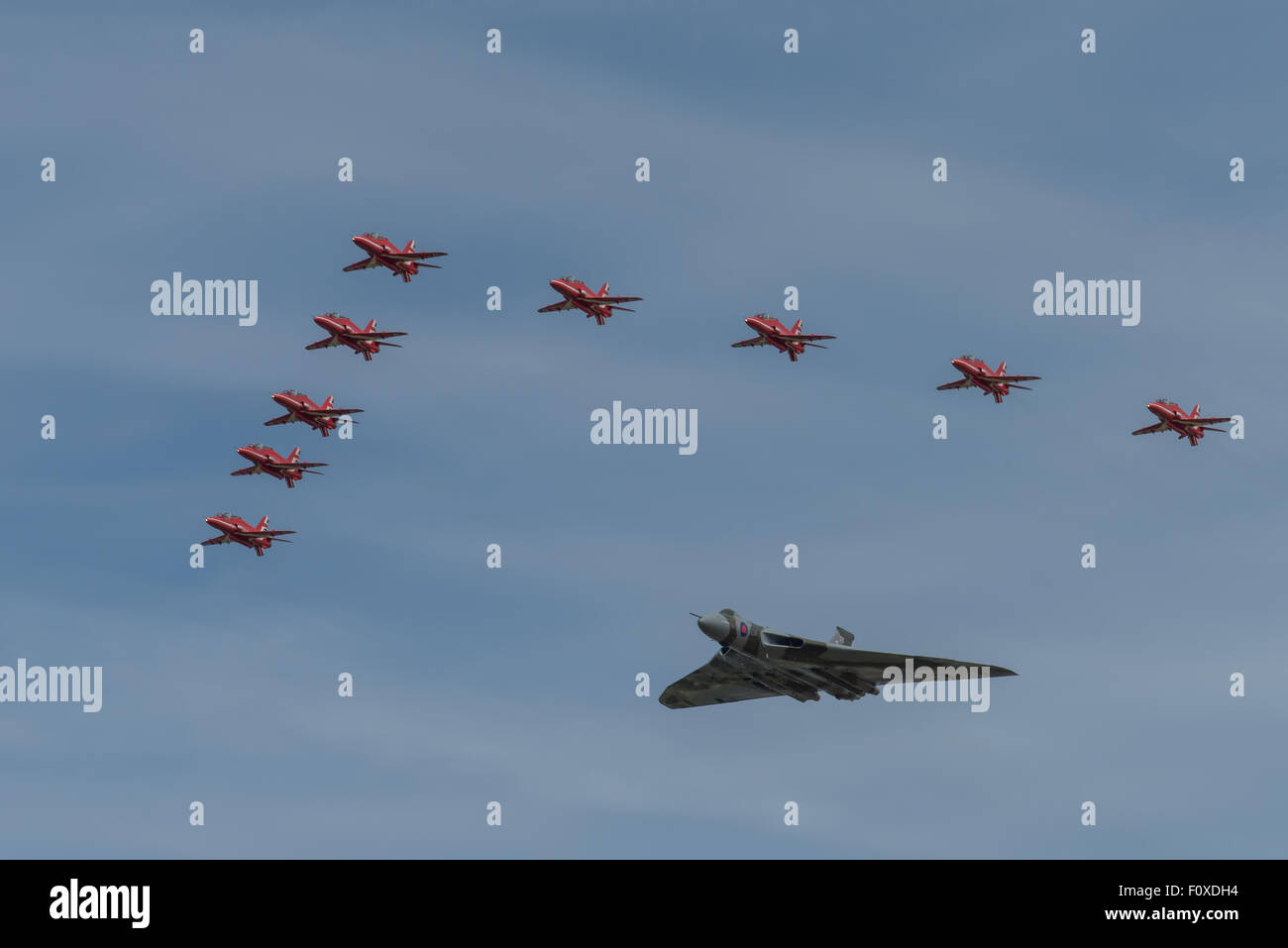 Vulcan Bomber in formation with the Red Arrows Stock Photo - Alamy
