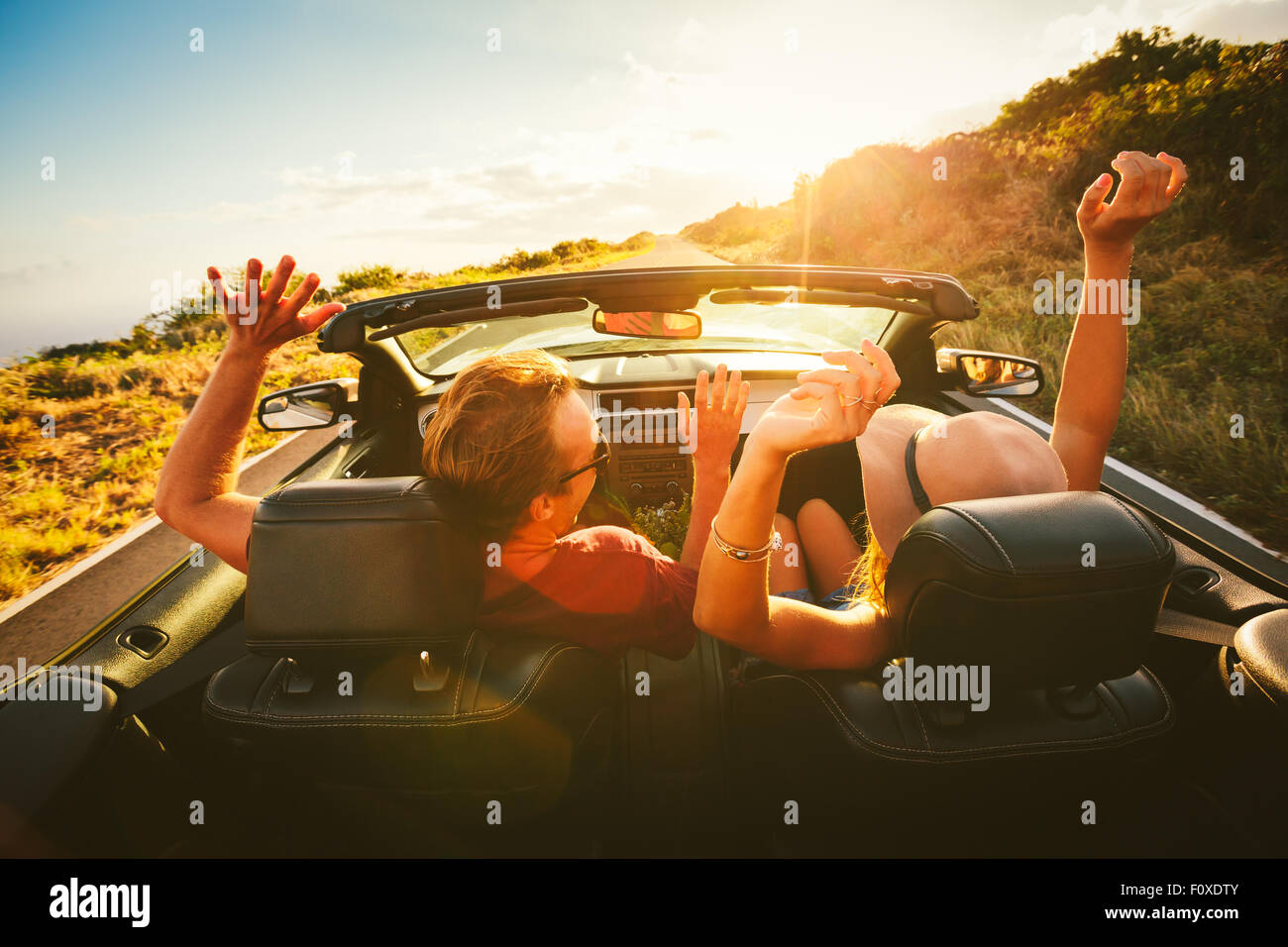 Driving into sunset convertible hi-res stock photography and images - Alamy