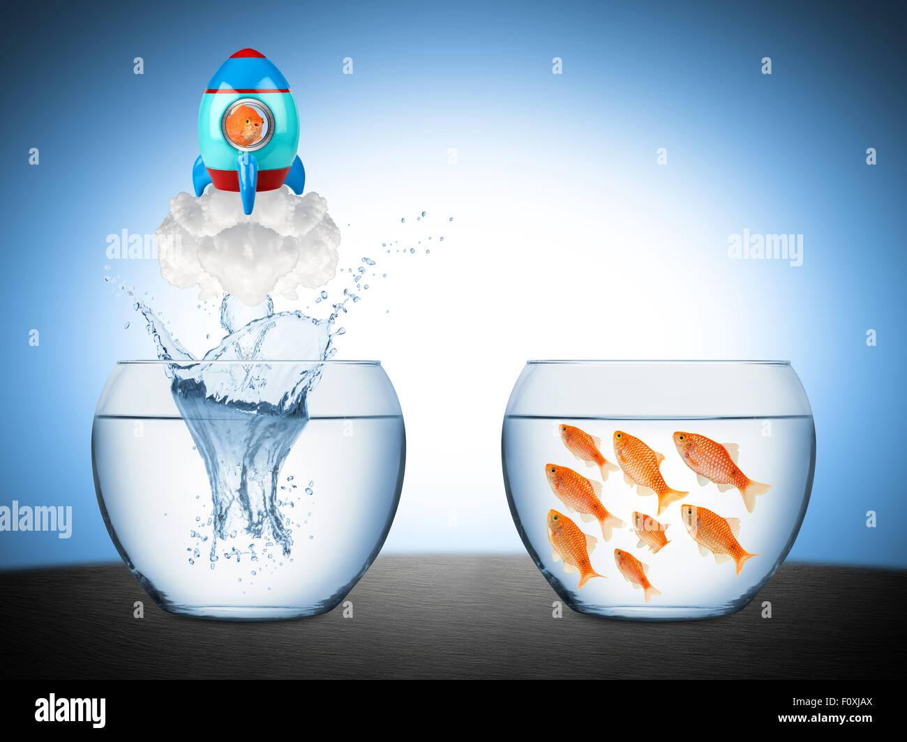 fish leaving fish bowl with rocket Stock Photo - Alamy