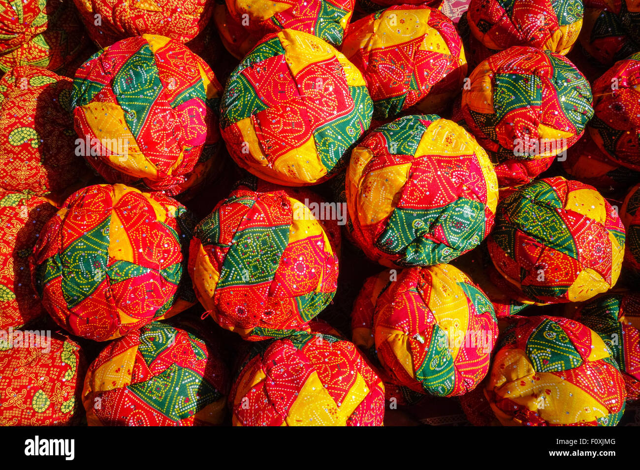Top view of colourful Rajasthani turbans (pagris) kept for sale outside ...