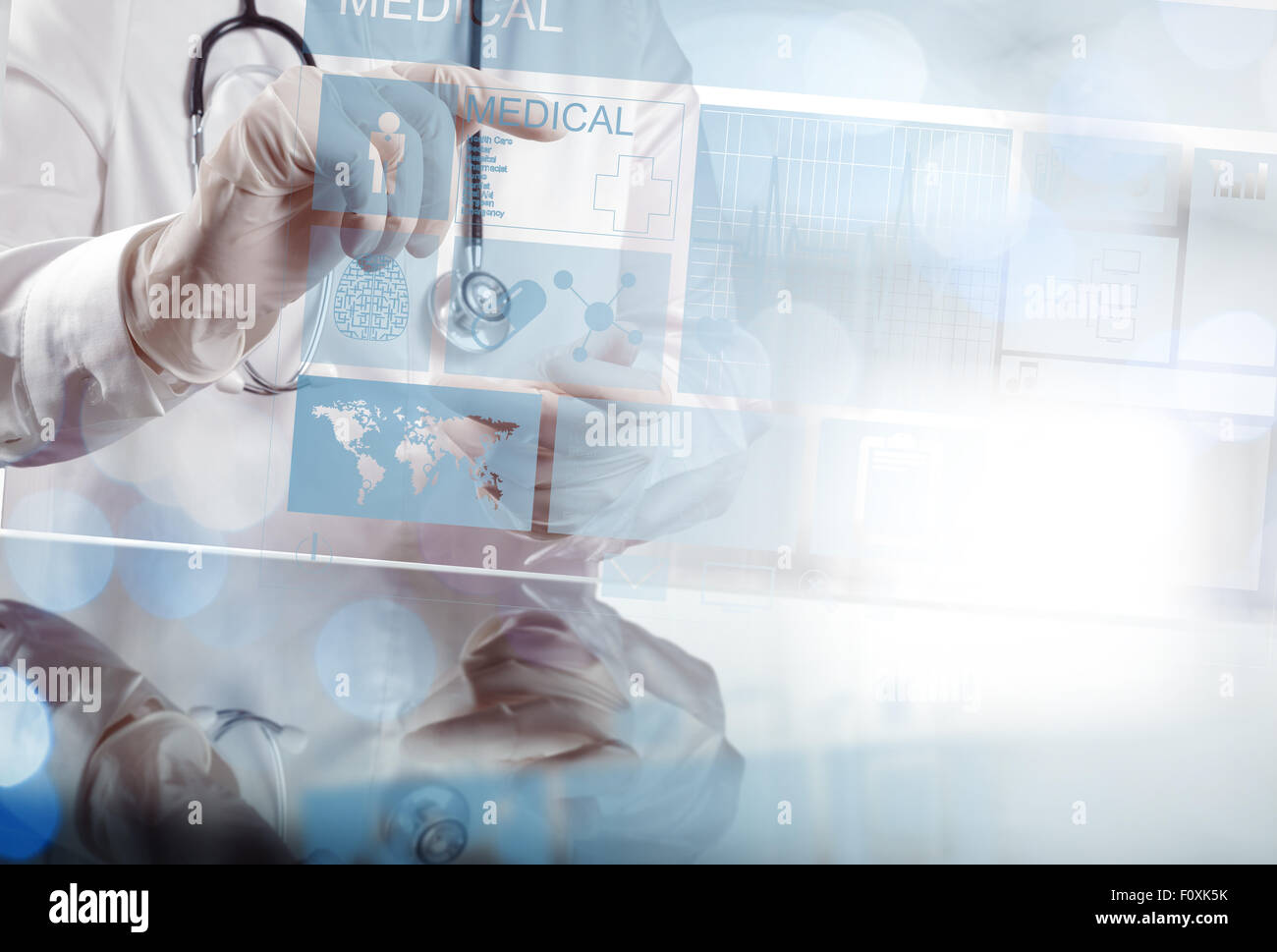 Medicine doctor hand working with modern computer interface as medical ...