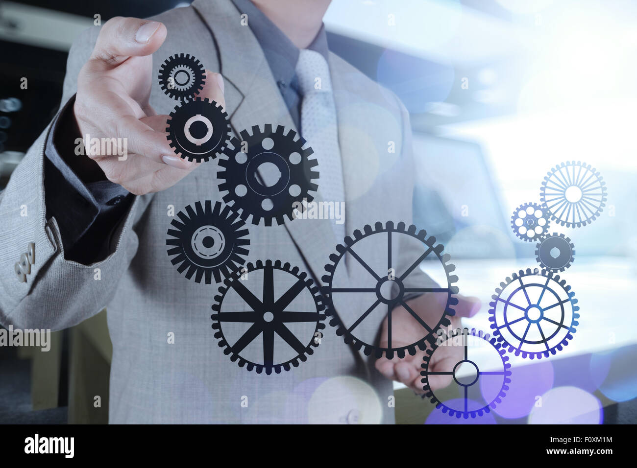 businessman hand draws gear to success concept Stock Photo - Alamy