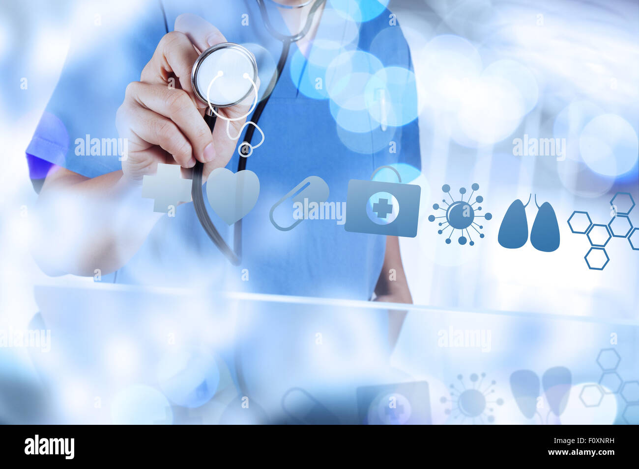 Medicine doctor hand working with modern computer interface as medical ...