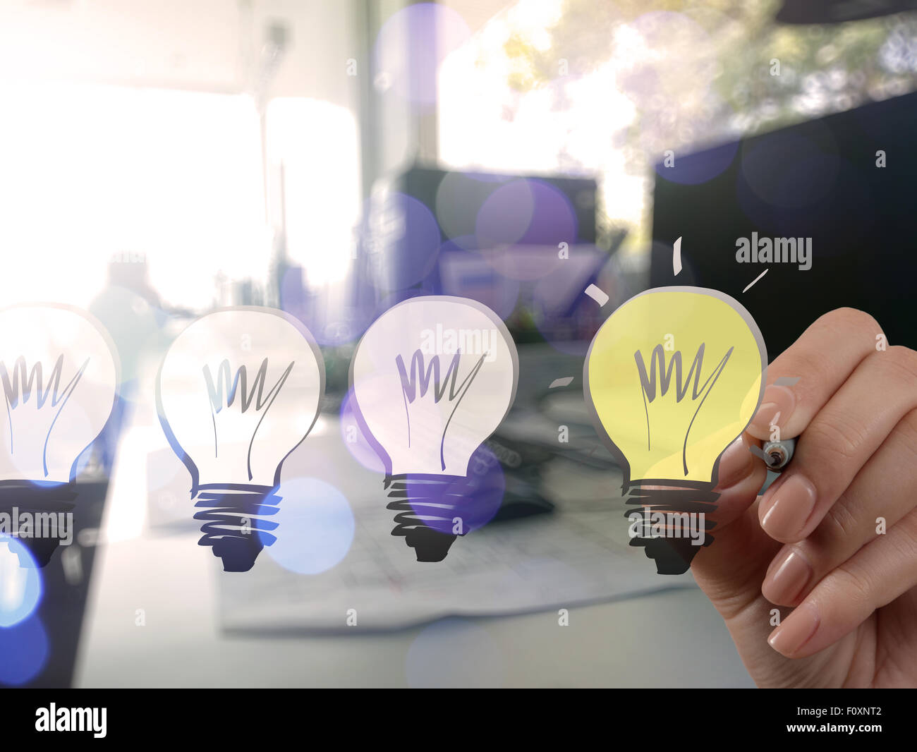 businessman hand drawing creative business strategy with light bulb as ...