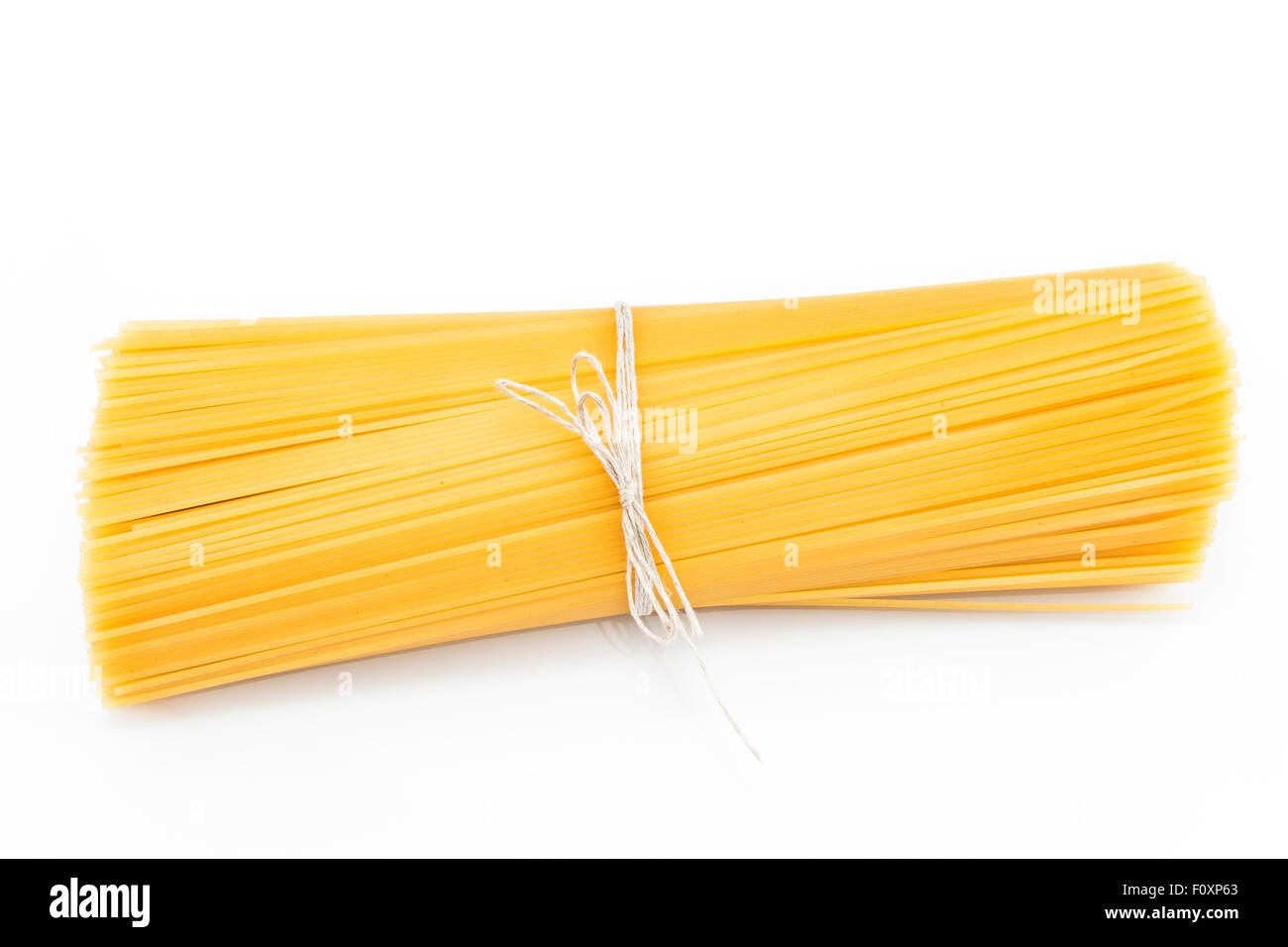 Bunch of spaghetti isolated on white Stock Photo - Alamy