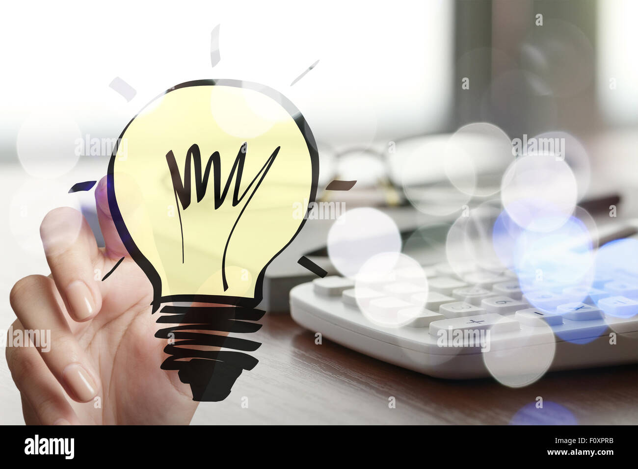 hand drawing creative business strategy with light bulb as concept ...