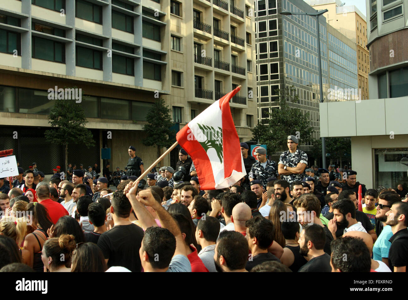 Beirut, Lebanon. 22nd Aug, 2015. Lebanese protesters hold banners and ...