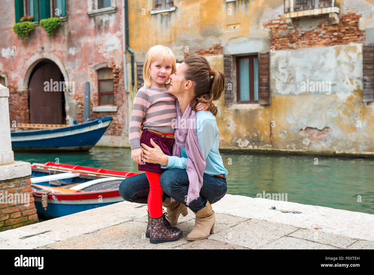 My mommy is the best, thinks this little girl, as her mother nuzzles ...