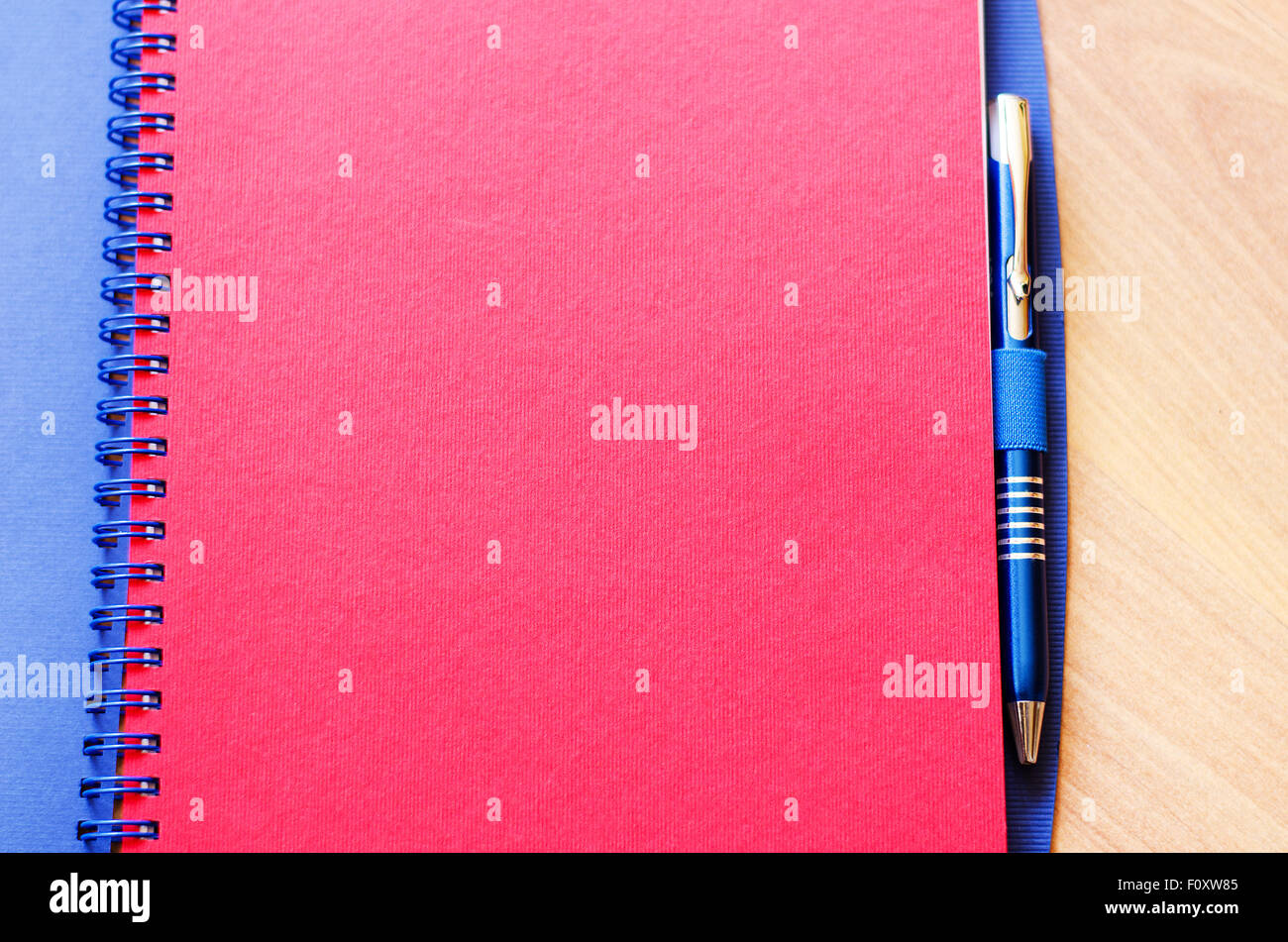 Red notepad and place for conceptual text Stock Photo - Alamy