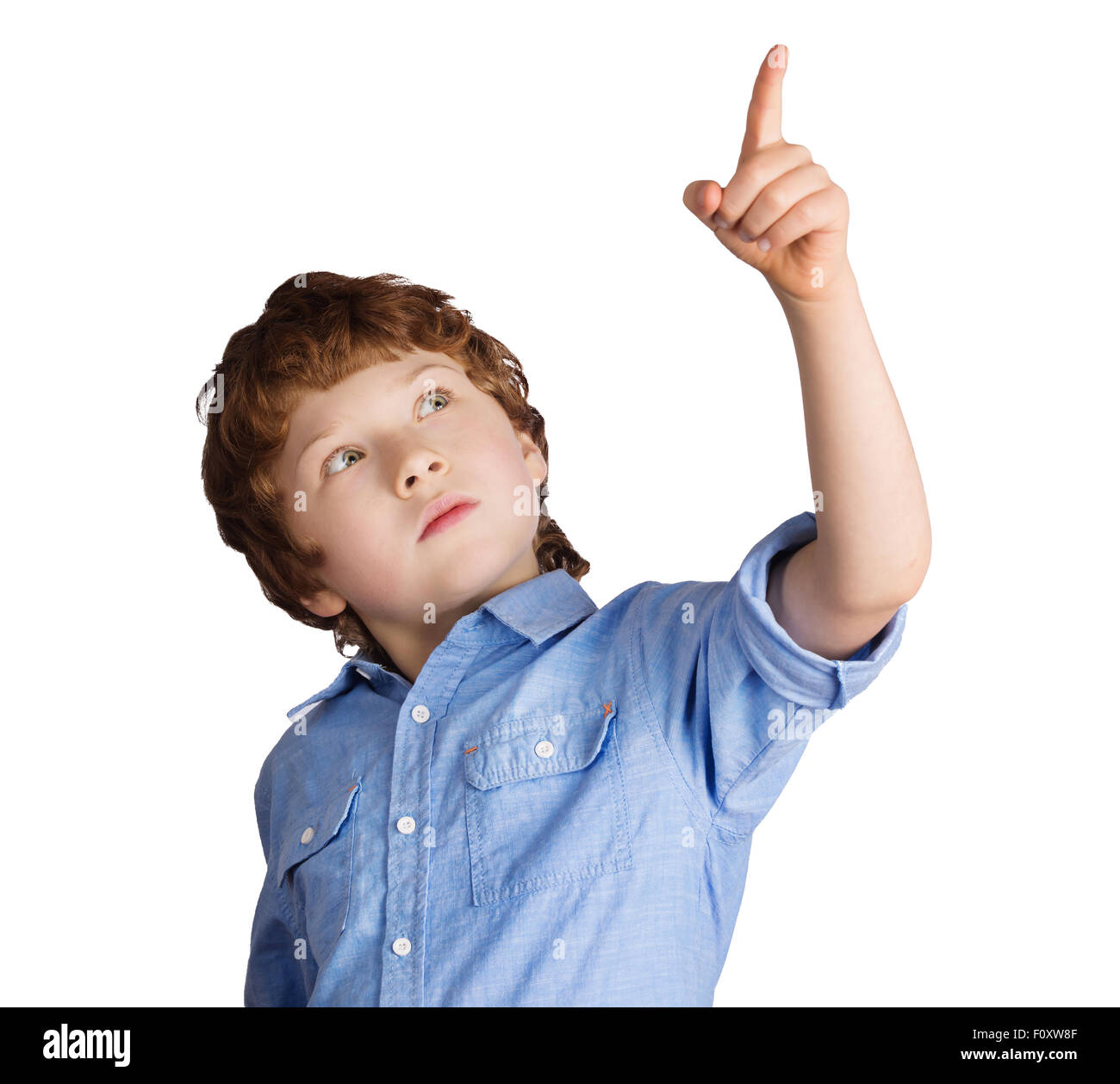 Handsome boy points with his finger. Isolated on white background Stock ...