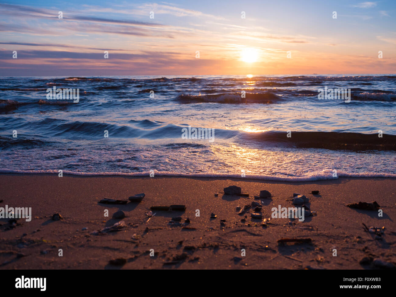 Baltic sea sunset, beach and beautiful skies Stock Photo - Alamy
