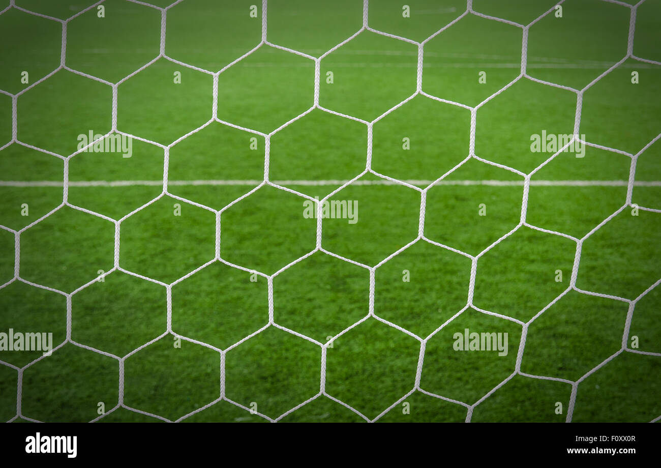 Soccer field with net texture background Stock Photo - Alamy