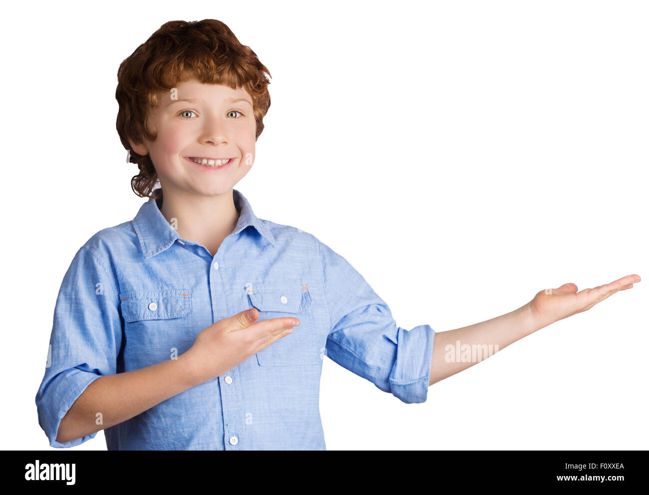 Handsome smiling boypoints with his hands. Isolated on white background ...