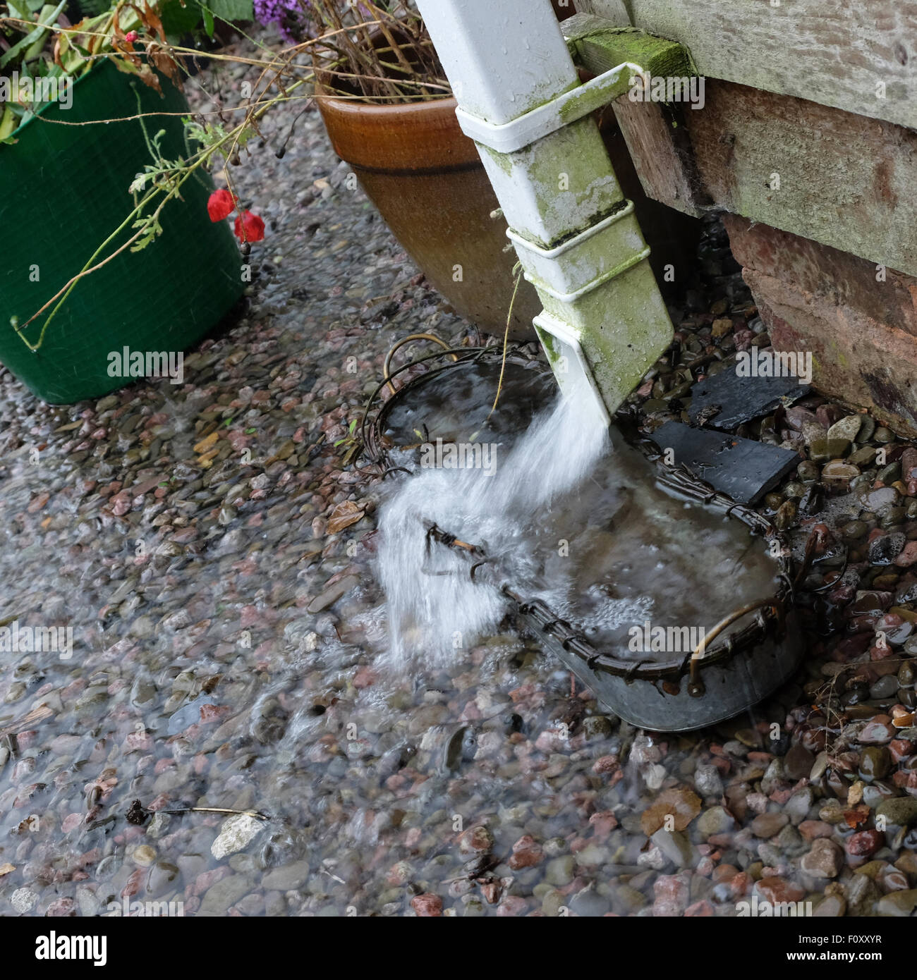 Pouring rain house puddles High Resolution Stock Photography and Images ...
