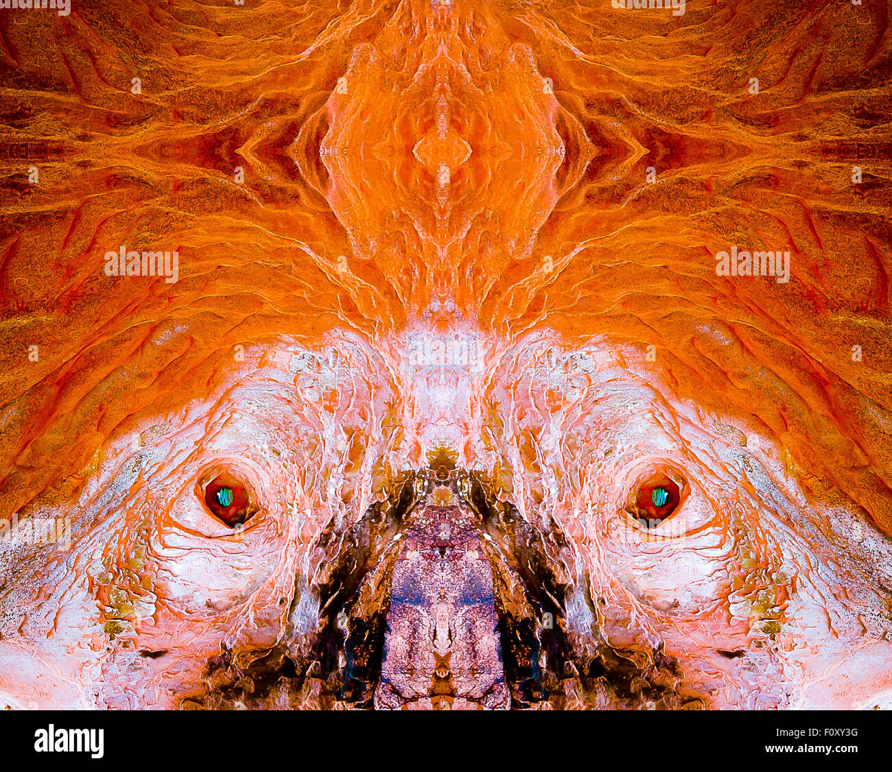 alien face on the wall of sandstone Stock Photo - Alamy