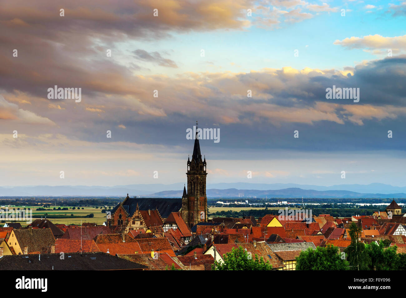 Beautiful colorful sunset over alsacien village Dambach-la-Ville ...
