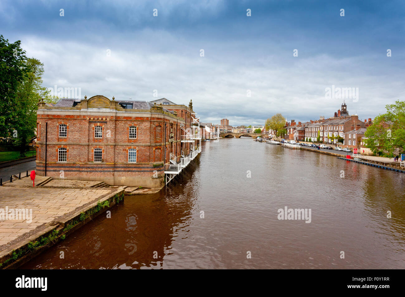 Former warehouses line the banks of the River Ouse in York, North ...