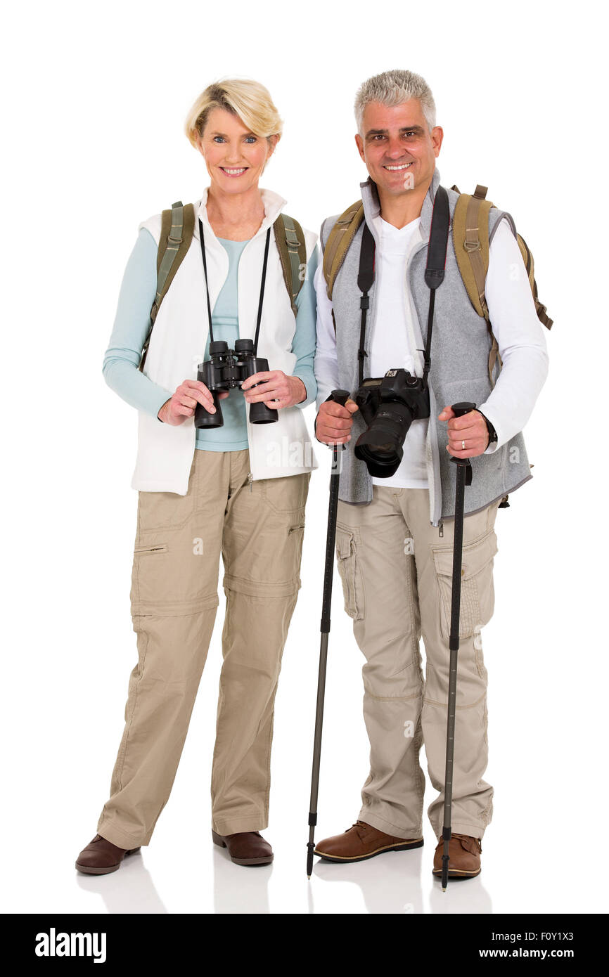 full length portrait of mid age couple standing on white Stock Photo ...
